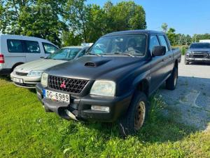 Melns Mitsubishi l-200 2004 Valmiera, ar dzinēja tilpumu 2.50 L un nobraukumu 236 tūkst. km par 3500 €, foto  vietnē AUTOMOTO.COM.LV