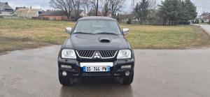 Black Mitsubishi l-200 2006 in Taurage, with an engine capacity of 2.48 L and mileage of 123 thousand km for 7400 €, photo  on AUTOMOTO.COM.LV