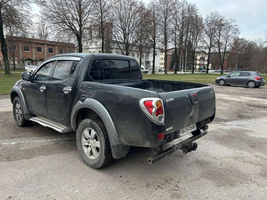 Melns Mitsubishi l-200 2006 Klaipėda, ar dzinēja tilpumu 2.48 L un nobraukumu 356 tūkst. km par 3800 €, foto 7 vietnē AUTOMOTO.COM.LV