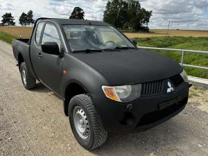 Melns Mitsubishi l-200 2006 Panevēža, ar dzinēja tilpumu 2.50 L un nobraukumu 0 tūkst. km par 4600 €, foto  vietnē AUTOMOTO.COM.LV