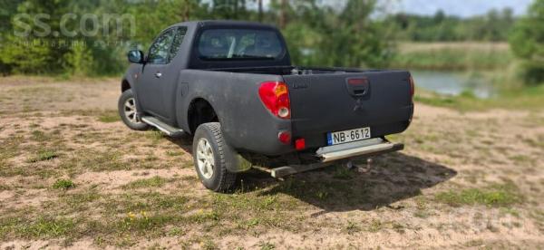 Melns Mitsubishi l-200 2006 Madona, ar dzinēja tilpumu 2.50 L un nobraukumu 470 tūkst. km par 6450 €, foto 4 vietnē AUTOMOTO.COM.LV