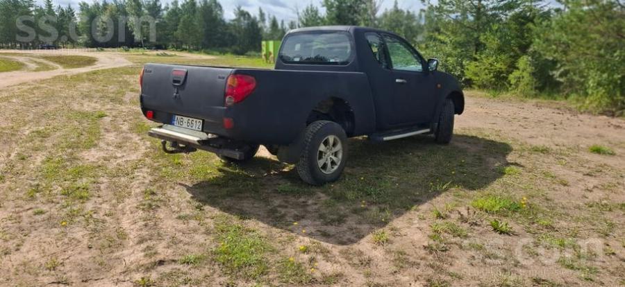 Melns Mitsubishi l-200 2006 Madona, ar dzinēja tilpumu 2.50 L un nobraukumu 470 tūkst. km par 6450 €, foto 6 vietnē AUTOMOTO.COM.LV