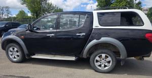 Melns Mitsubishi l-200 2006 Marijampole, ar dzinēja tilpumu 2.50 L un nobraukumu 317 tūkst. km par 5350 €, foto 6 vietnē AUTOMOTO.COM.LV