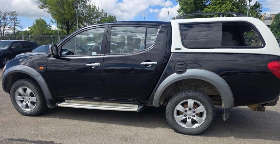 Melns Mitsubishi l-200 2006 Marijampole, ar dzinēja tilpumu 2.50 L un nobraukumu 317 tūkst. km par 5350 €, foto 6 vietnē AUTOMOTO.COM.LV