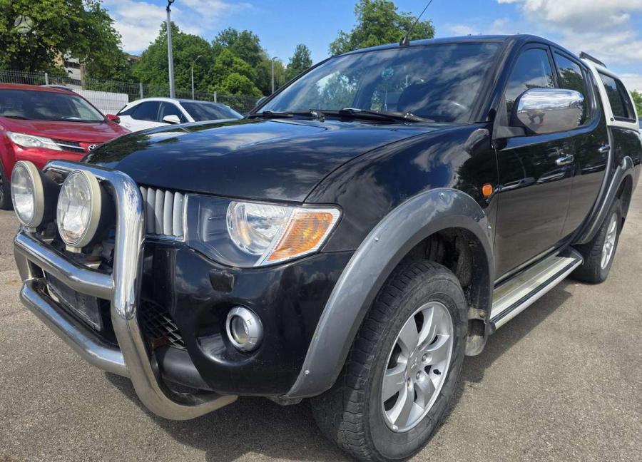 Melns Mitsubishi l-200 2006 Marijampole, ar dzinēja tilpumu 2.50 L un nobraukumu 317 tūkst. km par 5350 €, foto 7 vietnē AUTOMOTO.COM.LV