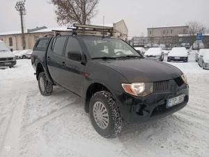 Black Mitsubishi l-200 2007 in Vilnius, with an engine capacity of 2.48 L and mileage of 363 thousand km for 7450 €, photo  on AUTOMOTO.COM.LV