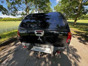 Black Mitsubishi l-200 2007 in Panevezys, with an engine capacity of 2.48 L and mileage of 325 thousand km for 7500 €, photo 6 on AUTOMOTO.COM.LV