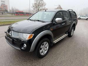 Black Mitsubishi l-200 2008 in Vilnius, with an engine capacity of 2.48 L and mileage of 284 thousand km for 6900 €, photo 9 on AUTOMOTO.COM.LV