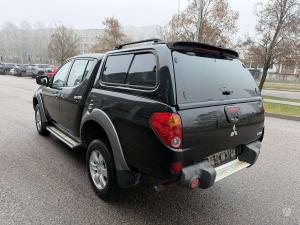 Black Mitsubishi l-200 2008 in Vilnius, with an engine capacity of 2.48 L and mileage of 284 thousand km for 6900 €, photo 10 on AUTOMOTO.COM.LV