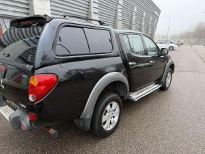 Black Mitsubishi l-200 2008 in Vilnius, with an engine capacity of 2.48 L and mileage of 284 thousand km for 6900 €, photo 12 on AUTOMOTO.COM.LV