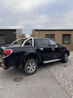 Black Mitsubishi l-200 2008 in Klaipeda, with an engine capacity of 2.50 L and mileage of 108 thousand km for 4700 €, photo 3 on AUTOMOTO.COM.LV