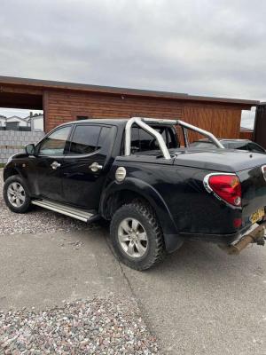 Black Mitsubishi l-200 2008 in Klaipeda, with an engine capacity of 2.50 L and mileage of 108 thousand km for 4700 €, photo 5 on AUTOMOTO.COM.LV