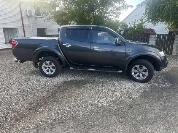 Melns Mitsubishi l-200 2011 Kauņa, ar dzinēja tilpumu 2.48 L un nobraukumu 180 tūkst. km par 5250 €, foto 5 vietnē AUTOMOTO.COM.LV