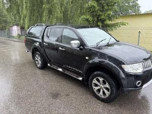 Black Mitsubishi l-200 2012 in Raseiniai, with an engine capacity of 2.48 L and mileage of 250 thousand km for 5400 €, photo  on AUTOMOTO.COM.LV