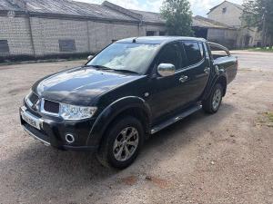 Melns Mitsubishi l-200 2012 Raseiniai, ar dzinēja tilpumu 2.48 L un nobraukumu 230 tūkst. km par 5000 €, foto 4 vietnē AUTOMOTO.COM.LV