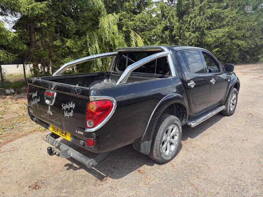 Melns Mitsubishi l-200 2012 Raseiniai, ar dzinēja tilpumu 2.48 L un nobraukumu 230 tūkst. km par 5000 €, foto 5 vietnē AUTOMOTO.COM.LV