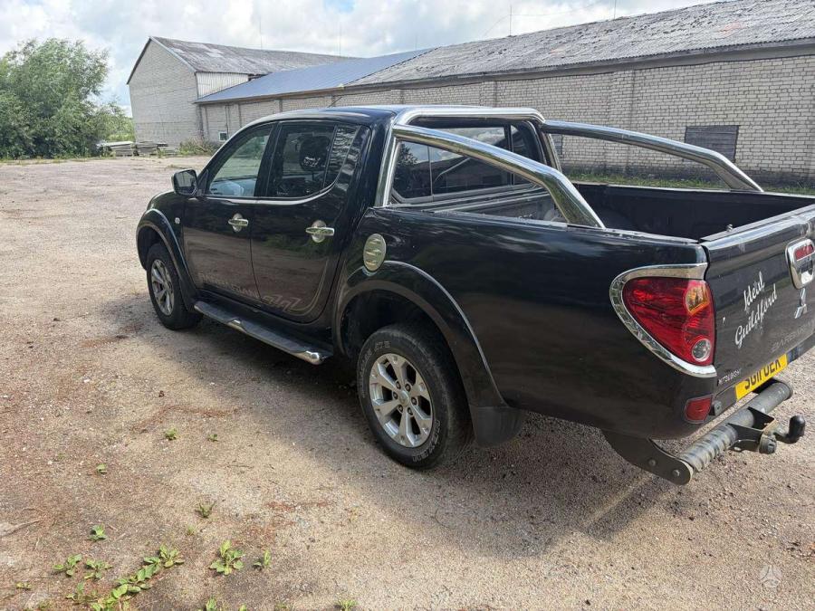 Melns Mitsubishi l-200 2012 Raseiniai, ar dzinēja tilpumu 2.48 L un nobraukumu 230 tūkst. km par 5000 €, foto 7 vietnē AUTOMOTO.COM.LV