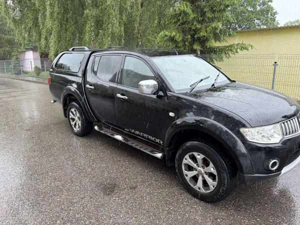 Melns Mitsubishi l-200 2012 Raseiniai, ar dzinēja tilpumu 2.48 L un nobraukumu 220 tūkst. km par 5200 €, foto 1 vietnē AUTOMOTO.COM.LV