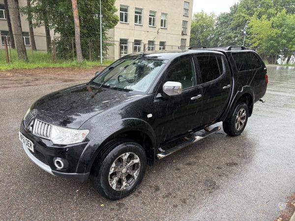 Melns Mitsubishi l-200 2012 Raseiniai, ar dzinēja tilpumu 2.48 L un nobraukumu 220 tūkst. km par 5200 €, foto 2 vietnē AUTOMOTO.COM.LV