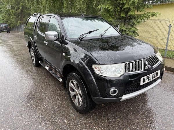 Melns Mitsubishi l-200 2012 Raseiniai, ar dzinēja tilpumu 2.48 L un nobraukumu 220 tūkst. km par 5200 €, foto 6 vietnē AUTOMOTO.COM.LV