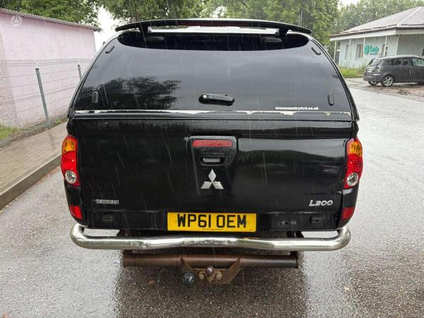 Melns Mitsubishi l-200 2012 Raseiniai, ar dzinēja tilpumu 2.48 L un nobraukumu 220 tūkst. km par 5200 €, foto 7 vietnē AUTOMOTO.COM.LV