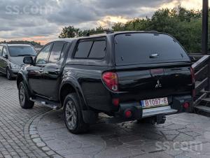 Черный Мицубиси Л 200 2013 в Лиепая, объемом двигателя 2.50 л и пробегом 187 тыс. км за 12900 €, фото 5 на AUTOMOTO.COM.LV