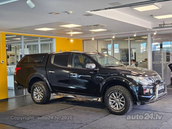 Black Mitsubishi l-200 2016 in Tallinn, with an engine capacity of 2.44 L and mileage of 151 thousand km for 19500 €, photo 1 on AUTOMOTO.COM.LV