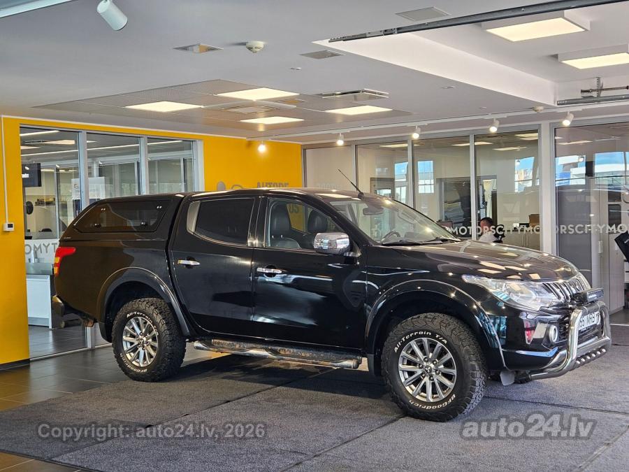 Black Mitsubishi l-200 2016 in Tallinn, with an engine capacity of 2.44 L and mileage of 151 thousand km for 19500 €, photo 1 on AUTOMOTO.COM.LV