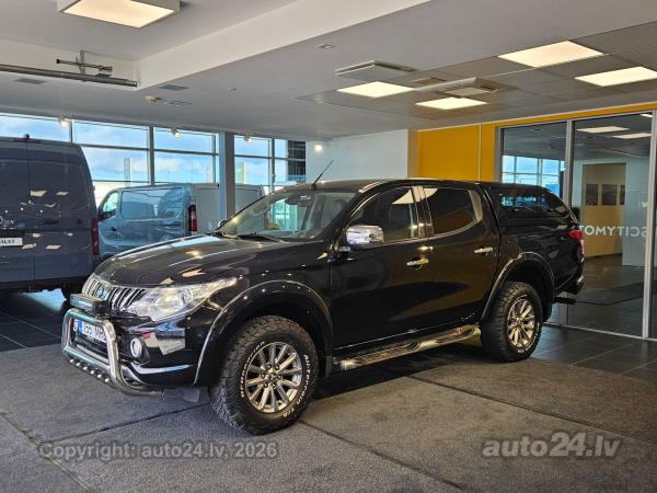 Black Mitsubishi l-200 2016 in Tallinn, with an engine capacity of 2.44 L and mileage of 151 thousand km for 19500 €, photo 3 on AUTOMOTO.COM.LV