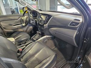Black Mitsubishi l-200 2016 in Tallinn, with an engine capacity of 2.44 L and mileage of 151 thousand km for 19500 €, photo 9 on AUTOMOTO.COM.LV