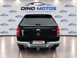 Black Mitsubishi l-200 2017 in Riga, with an engine capacity of 2.40 L and mileage of 265 thousand km for 13800 €, photo 6 on AUTOMOTO.COM.LV