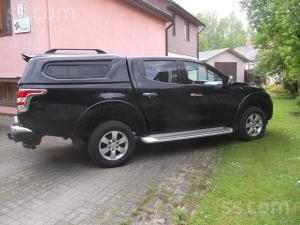 Black Mitsubishi l-200 2018 in Riga, with an engine capacity of 2.40 L and mileage of 112 thousand km for 12490 €, photo 5 on AUTOMOTO.COM.LV