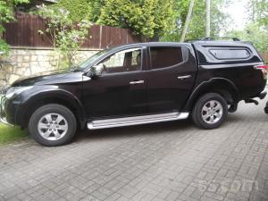 Black Mitsubishi l-200 2018 in Riga, with an engine capacity of 2.40 L and mileage of 112 thousand km for 12490 €, photo 6 on AUTOMOTO.COM.LV