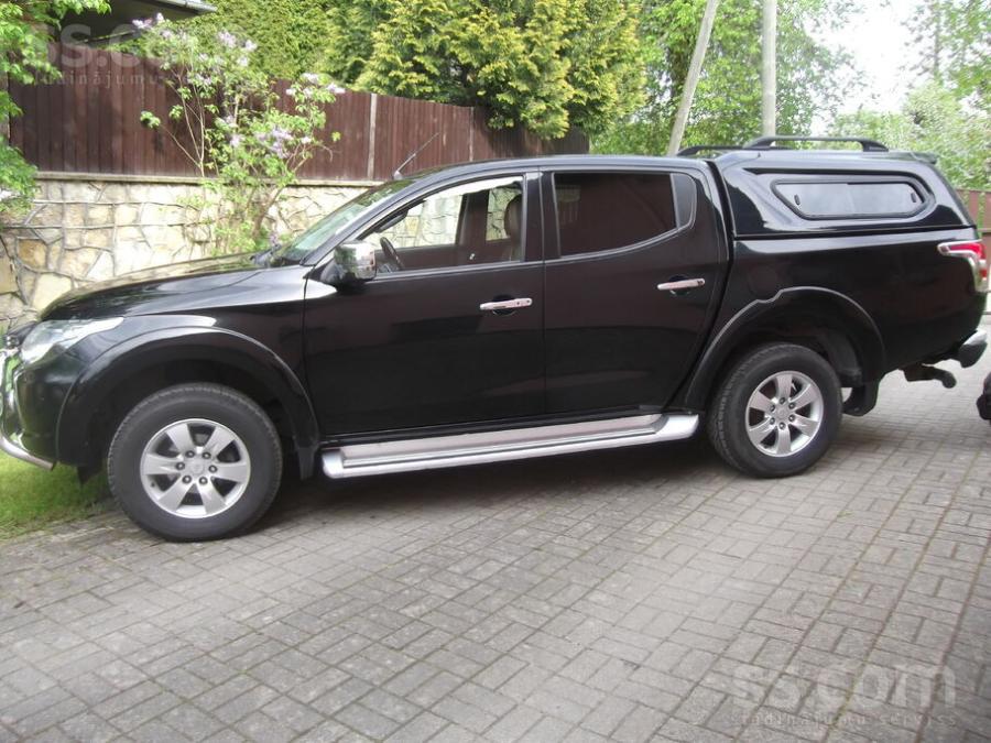 Black Mitsubishi l-200 2018 in Riga, with an engine capacity of 2.40 L and mileage of 112 thousand km for 12490 €, photo 6 on AUTOMOTO.COM.LV