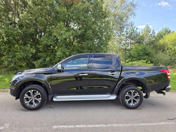 Mitsubishi l-200 2018 in Siauliai on AUTOMOTO.COM.LV Black Mitsubishi l-200 2018 in Siauliai, with an engine capacity of 2.40 L and mileage of 200 thousand km for 12800 €, photo 8 on AUTOMOTO.COM.LV