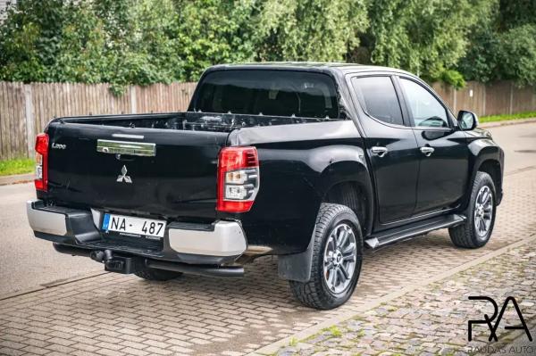 Black Mitsubishi l-200 2021 in Riga, with an engine capacity of 2.30 L and mileage of 344 thousand km for 24188 €, photo 3 on AUTOMOTO.COM.LV