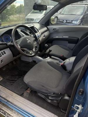Blue Mitsubishi l-200 2006 in Pasvalys, with an engine capacity of 2.50 L and mileage of 380 thousand km for 4799 €, photo 7 on AUTOMOTO.COM.LV