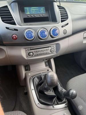 Blue Mitsubishi l-200 2006 in Pasvalys, with an engine capacity of 2.50 L and mileage of 380 thousand km for 4799 €, photo 8 on AUTOMOTO.COM.LV