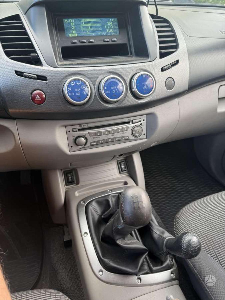 Blue Mitsubishi l-200 2006 in Pasvalys, with an engine capacity of 2.50 L and mileage of 380 thousand km for 4799 €, photo 8 on AUTOMOTO.COM.LV