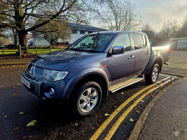 Blue Mitsubishi l-200 2010 in Riga, with an engine capacity of 2.48 L and mileage of 185 thousand km for 4800 €, photo 3 on AUTOMOTO.COM.LV