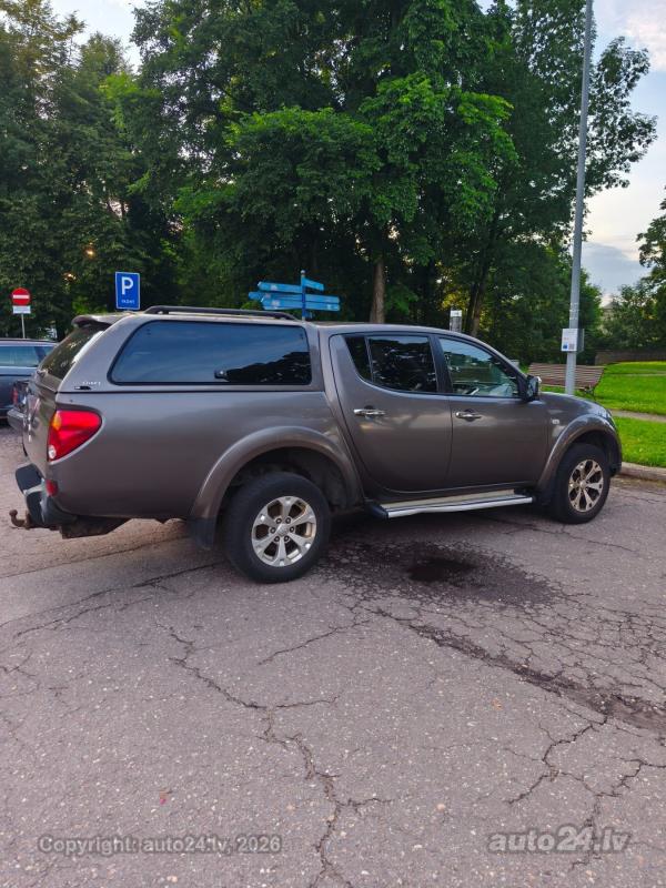 Brūns Mitsubishi l-200 2010 Narva, ar dzinēja tilpumu 2.50 L un nobraukumu 295 tūkst. km par 9000 €, foto 2 vietnē AUTOMOTO.COM.LV