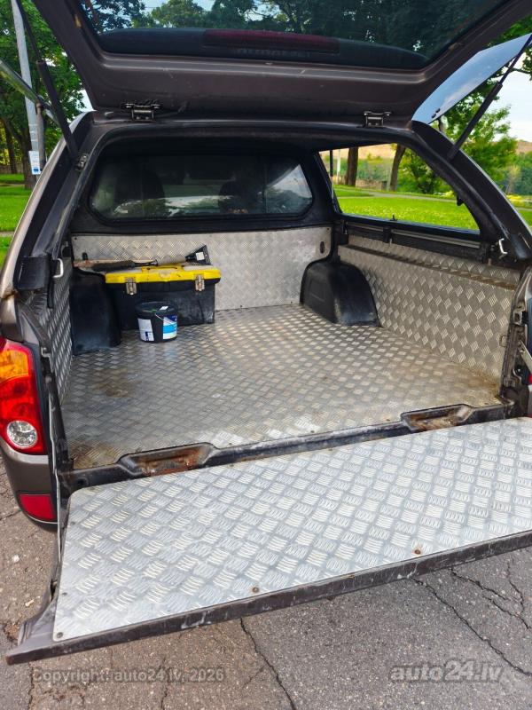 Brūns Mitsubishi l-200 2010 Narva, ar dzinēja tilpumu 2.50 L un nobraukumu 295 tūkst. km par 9000 €, foto 6 vietnē AUTOMOTO.COM.LV