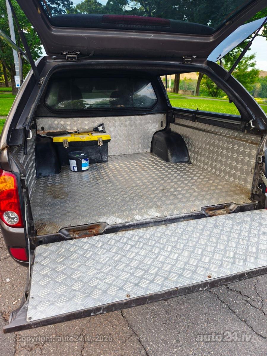 Brūns Mitsubishi l-200 2010 Narva, ar dzinēja tilpumu 2.50 L un nobraukumu 295 tūkst. km par 9000 €, foto 7 vietnē AUTOMOTO.COM.LV