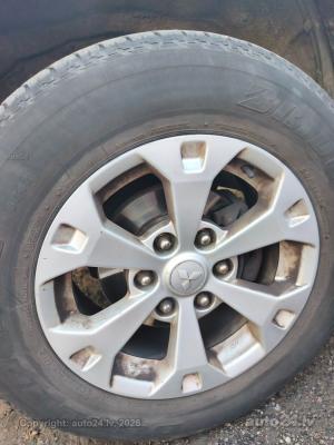 Brūns Mitsubishi l-200 2010 Narva, ar dzinēja tilpumu 2.50 L un nobraukumu 295 tūkst. km par 9000 €, foto 15 vietnē AUTOMOTO.COM.LV
