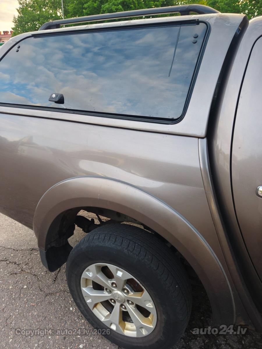 Brūns Mitsubishi l-200 2010 Narva, ar dzinēja tilpumu 2.50 L un nobraukumu 295 tūkst. km par 9000 €, foto 16 vietnē AUTOMOTO.COM.LV