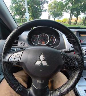 Brūns Mitsubishi l-200 2010 Valka, ar dzinēja tilpumu 2.50 L un nobraukumu 295 tūkst. km par 7500 €, foto 9 vietnē AUTOMOTO.COM.LV
