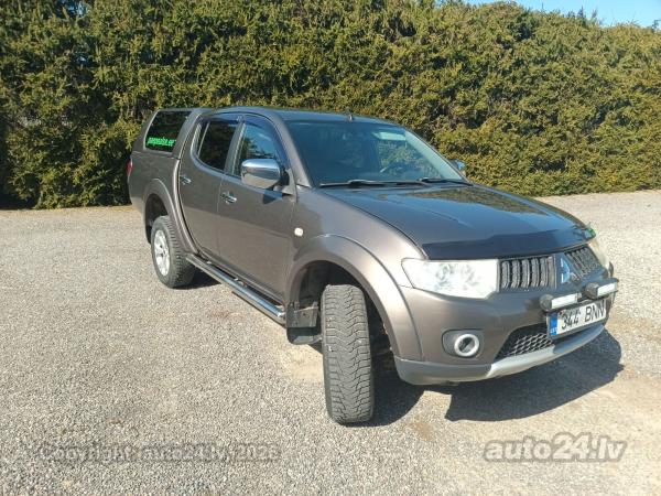 Brown Mitsubishi l-200 2012 in Haapsalu, with an engine capacity of 2.50 L and mileage of 256 thousand km for 11900 €, photo 3 on AUTOMOTO.COM.LV