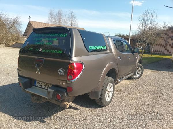 Brown Mitsubishi l-200 2012 in Haapsalu, with an engine capacity of 2.50 L and mileage of 256 thousand km for 11900 €, photo 5 on AUTOMOTO.COM.LV