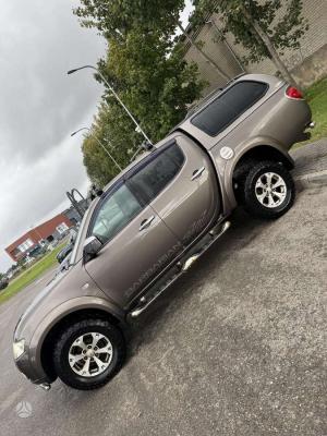 Brown Mitsubishi l-200 2013 in Silute, with an engine capacity of 2.50 L and mileage of 130 thousand km for 5800 €, photo  on AUTOMOTO.COM.LV