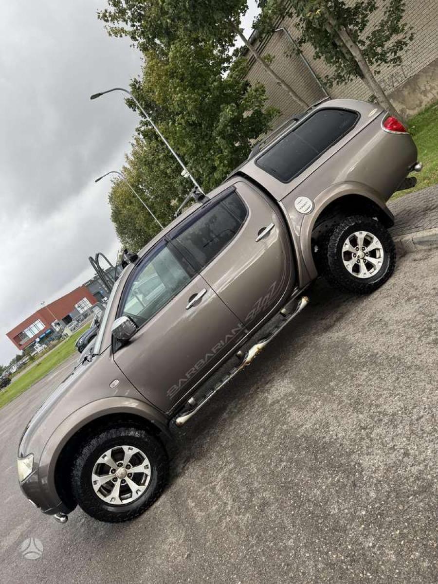 Brown Mitsubishi l-200 2013 in Silute, with an engine capacity of 2.50 L and mileage of 130 thousand km for 5800 €, photo 1 on AUTOMOTO.COM.LV